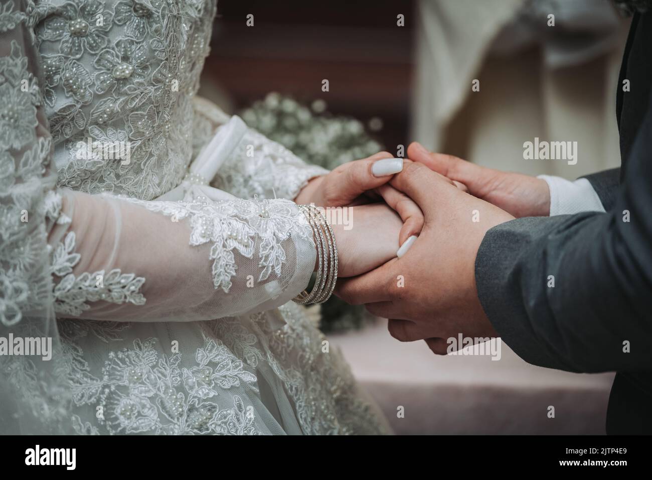 wedding hands ring inserting couple marriage Stock Photo - Alamy