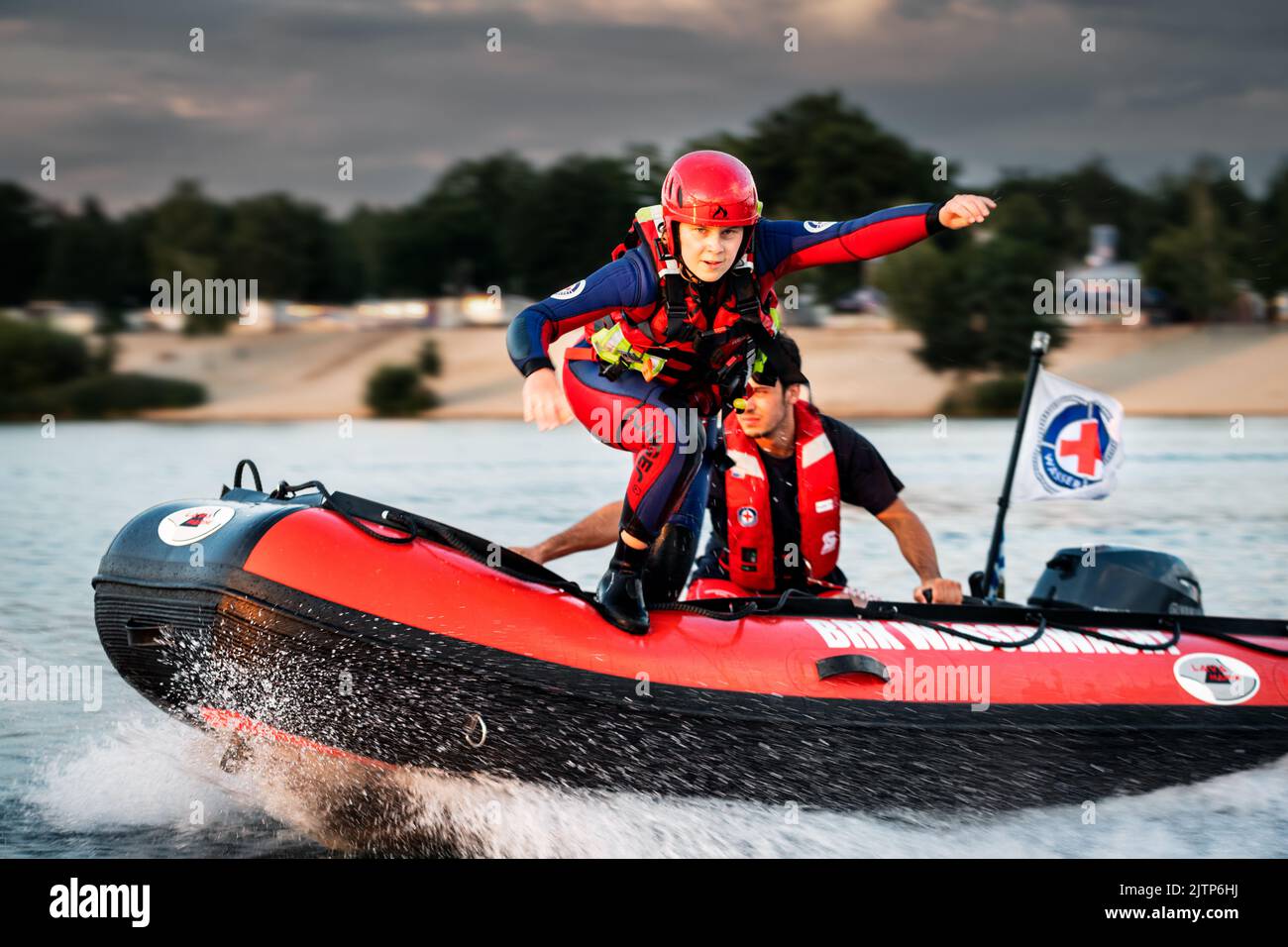 Water rescue jumping of a motorboat in full speed Stock Photo - Alamy