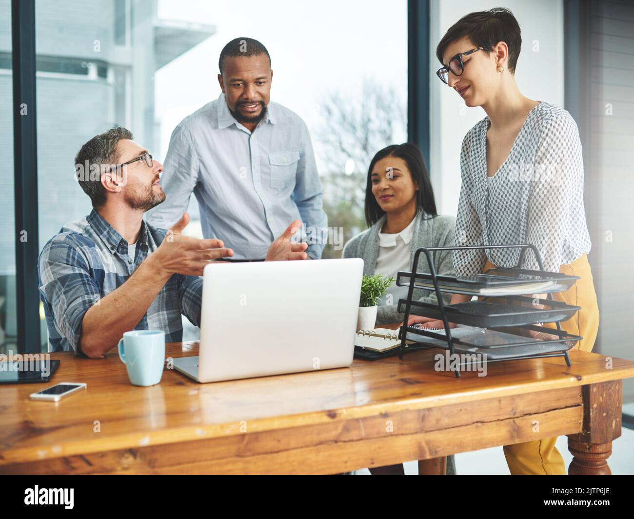 Working together to get the task done. businesspeople working together ...