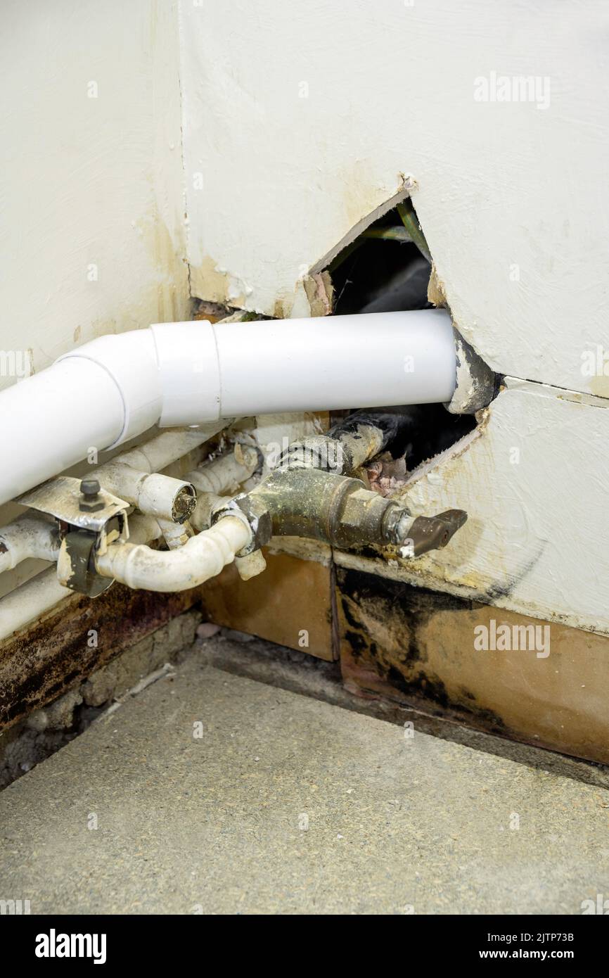 Renew tube into wall Stock Photo - Alamy