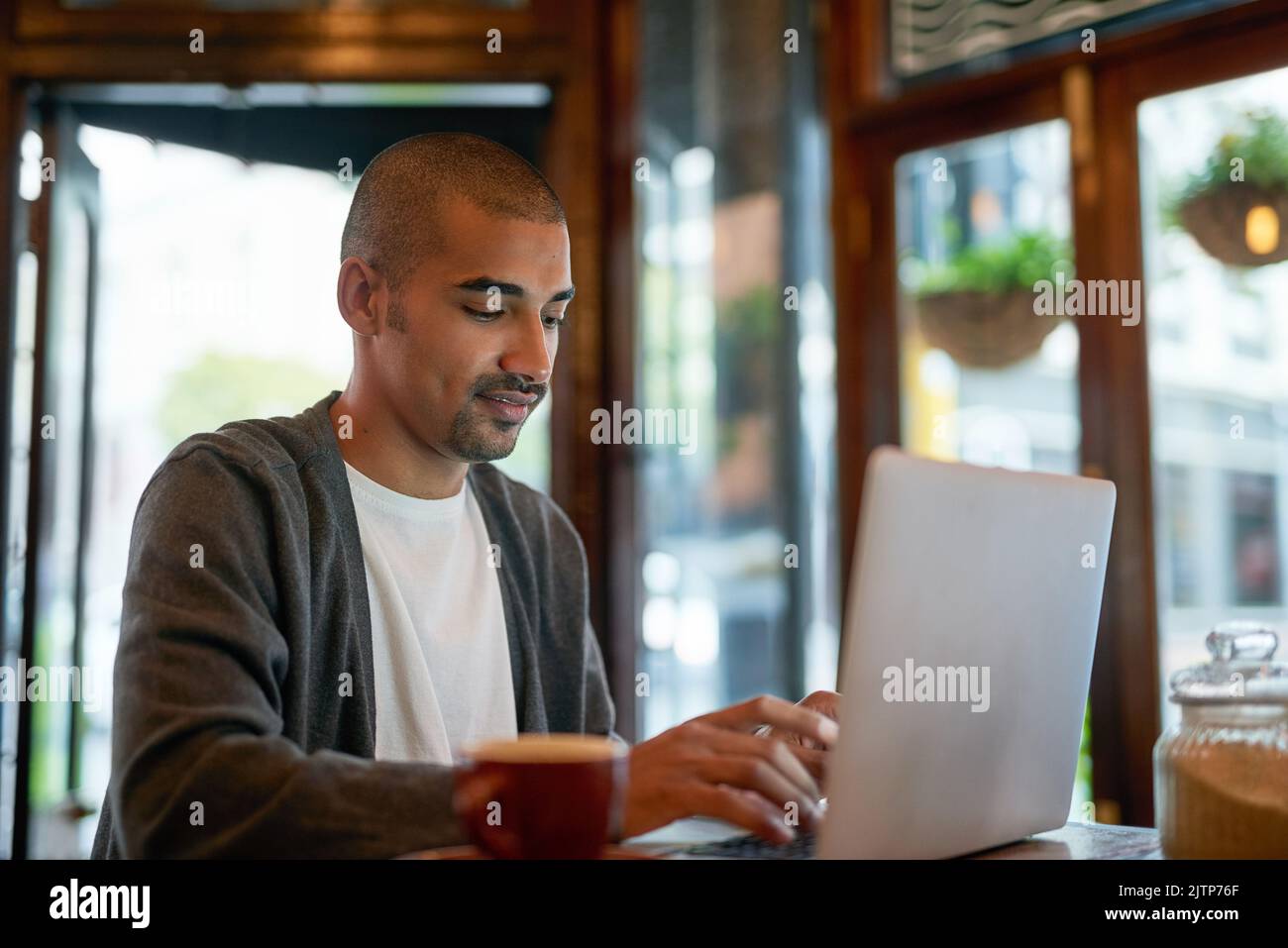 This is his perfect working environment to stay productive. a young man ...