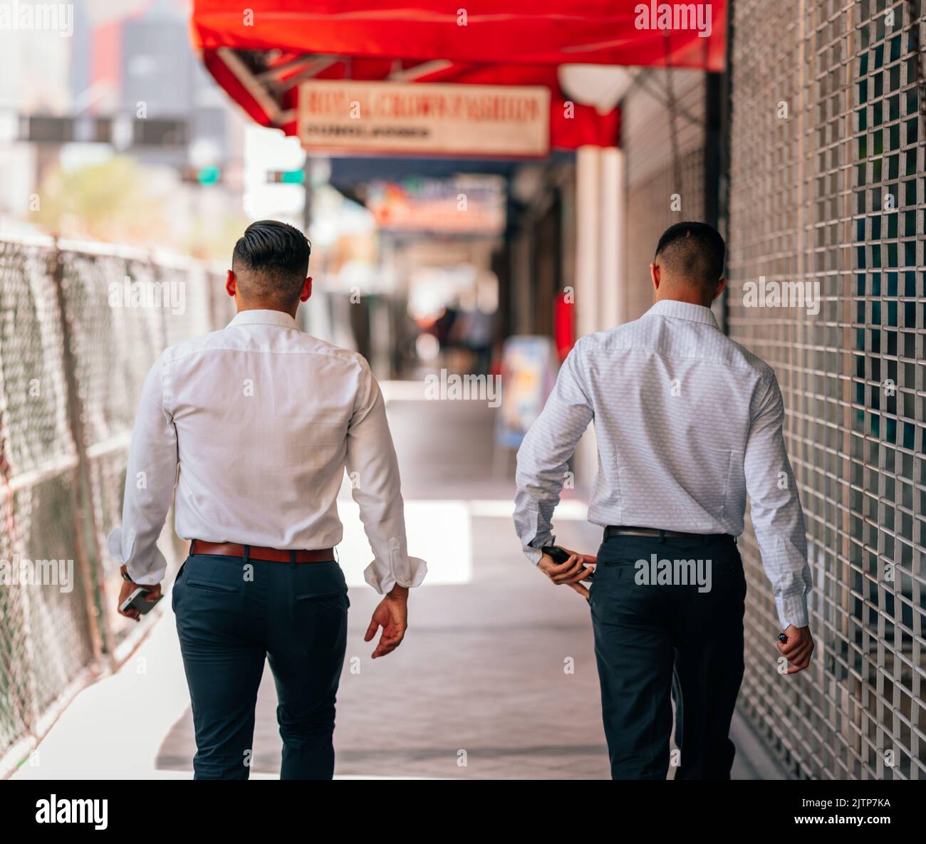 Back view of two businessmen at hi-res stock photography and images - Alamy