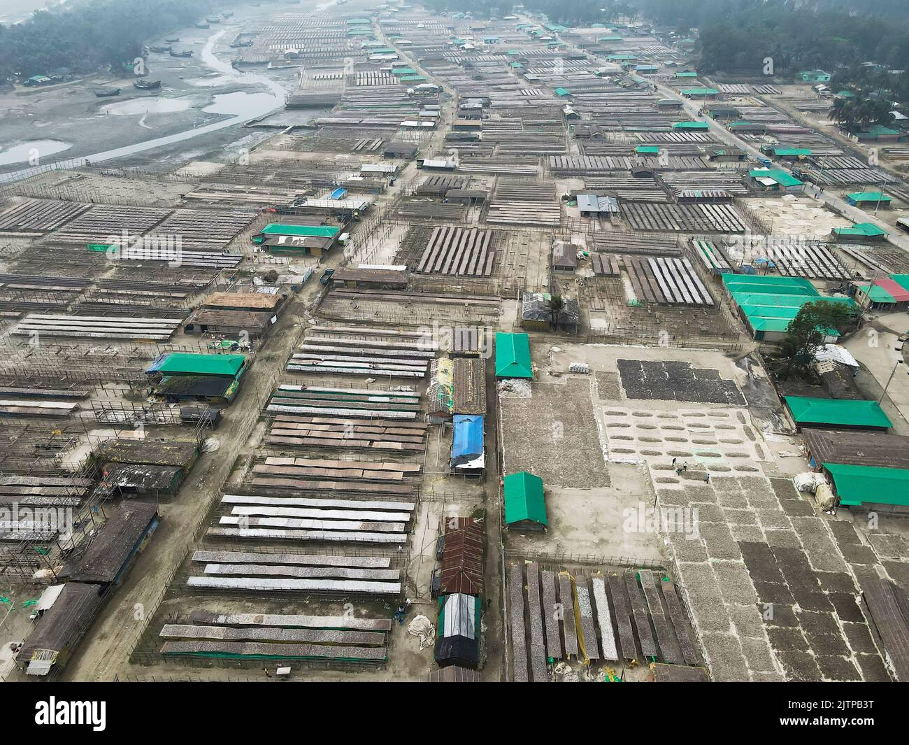 Aerial view of dried fish processing. One of the oldest methods of food ...