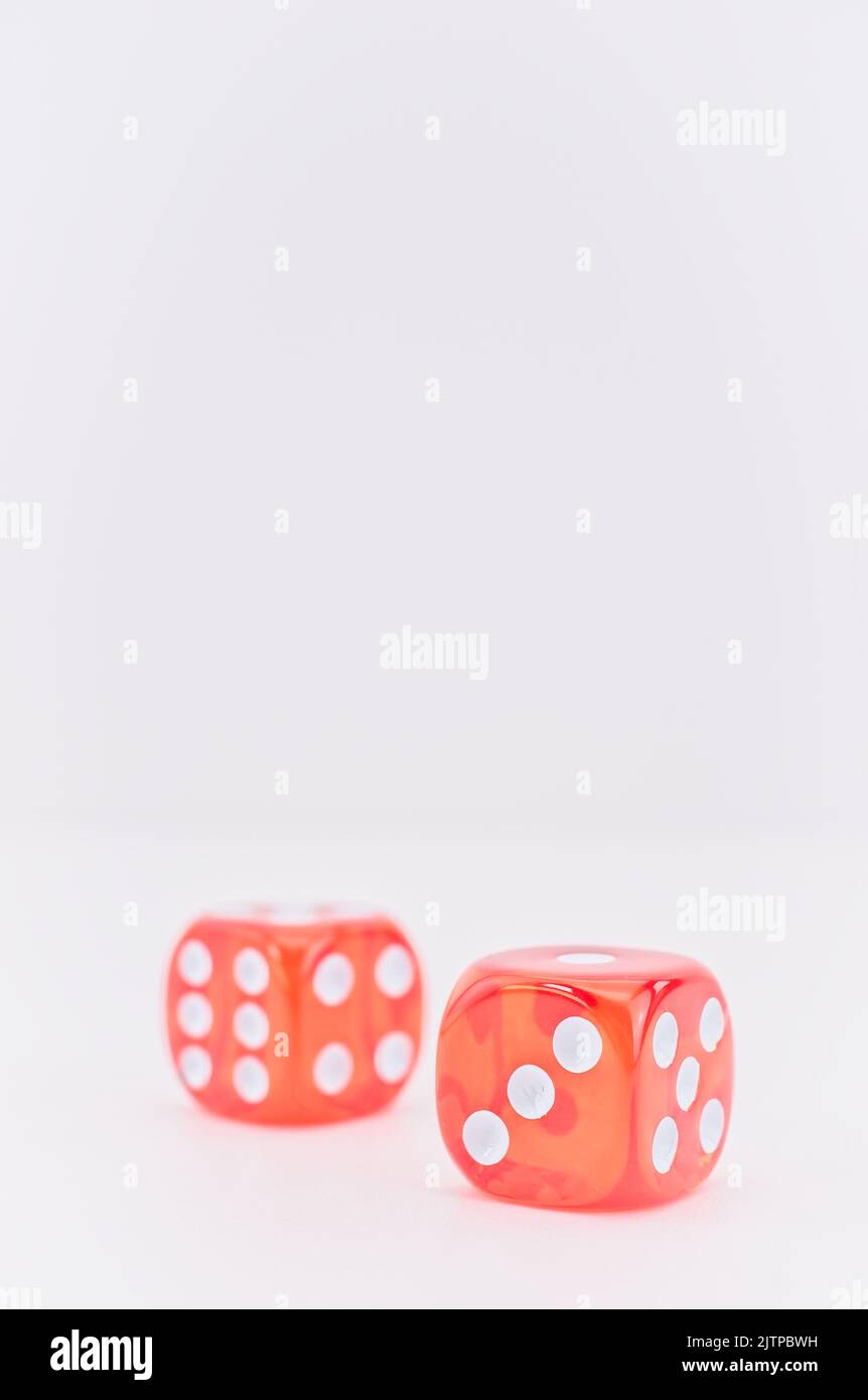 throw of dice on a white table with space for text Stock Photo - Alamy