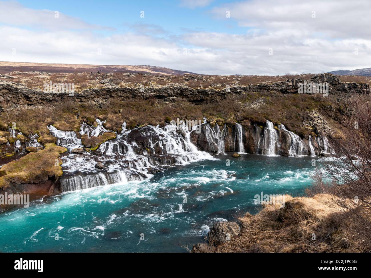 Hraunfossar, waterfalls flowing over a lava field, near Húsafell ...