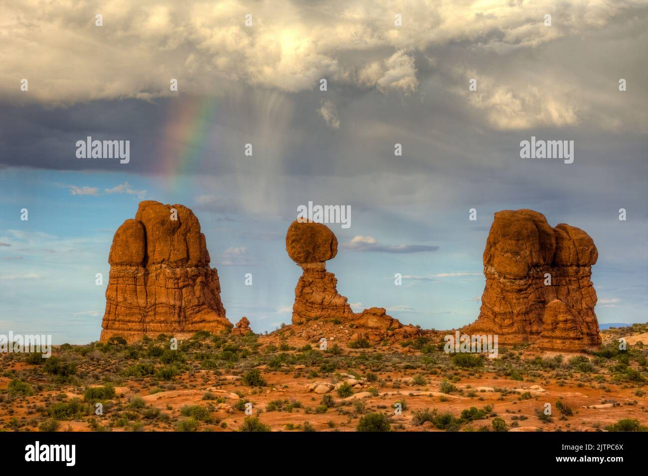 Rainbow arches over mountain hi-res stock photography and images - Alamy
