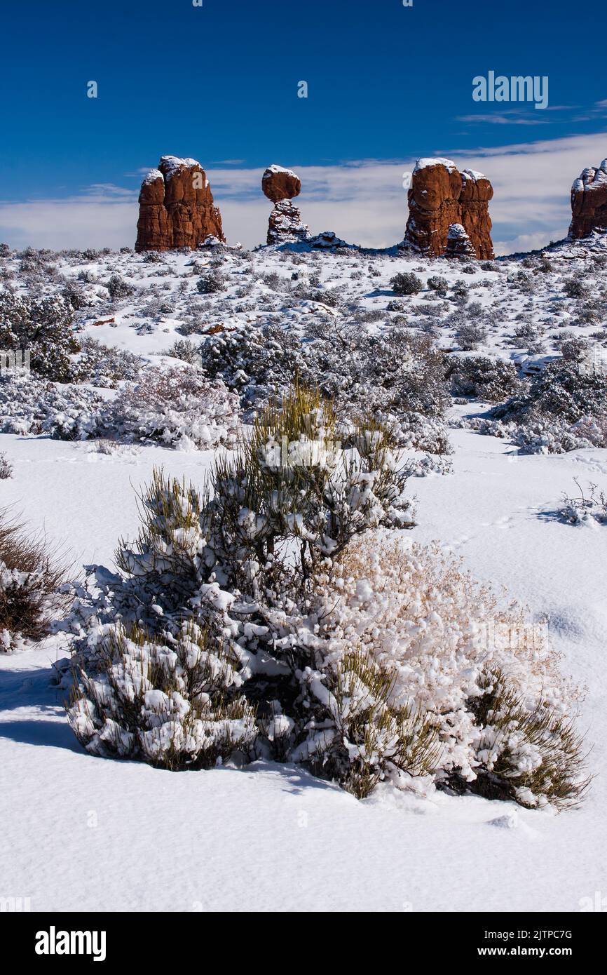 Balanced Rock after a winter snowfall in Arches National Park, Moab ...