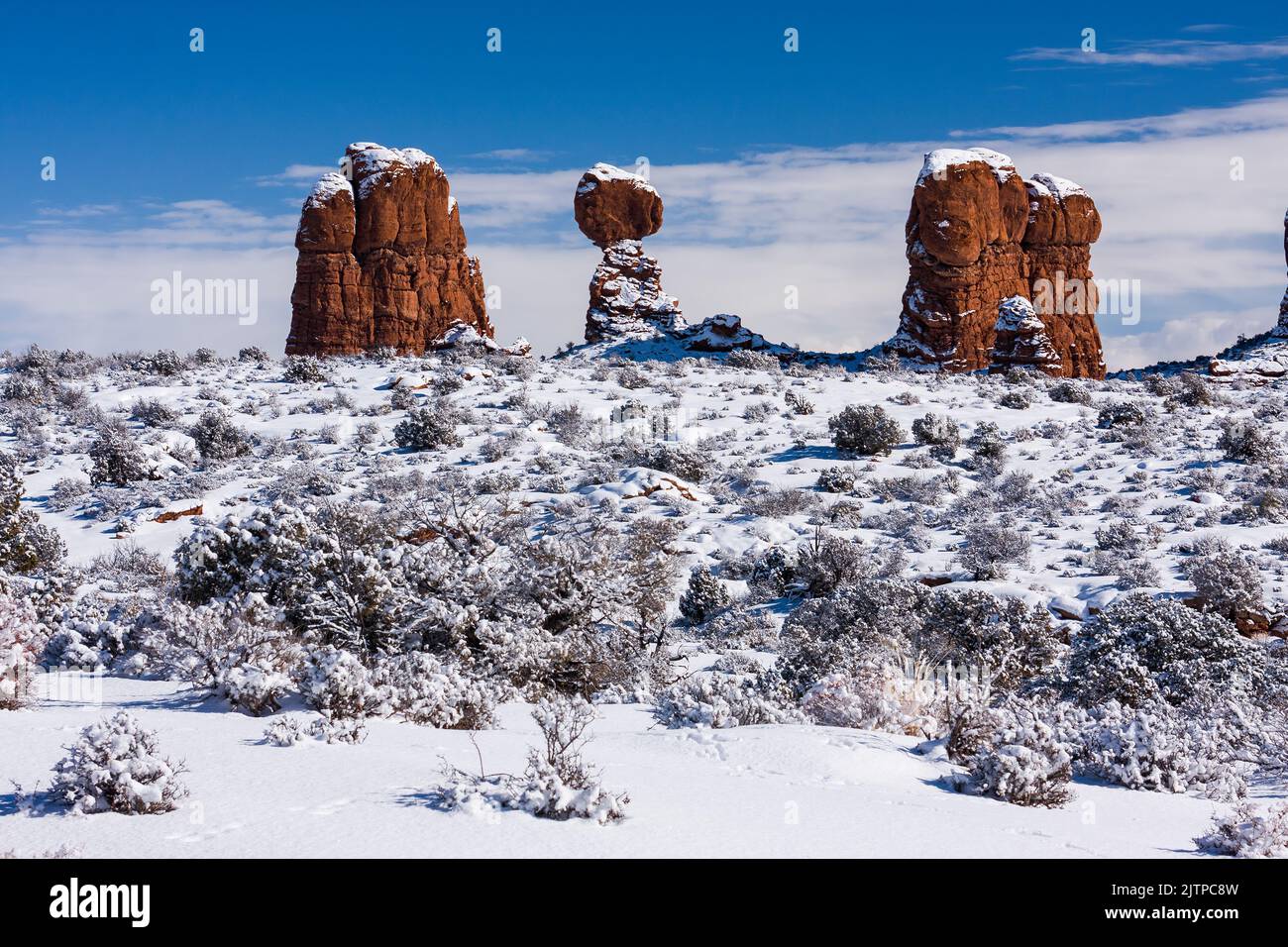 Balanced Rock after a winter snowfall in Arches National Park, Moab ...