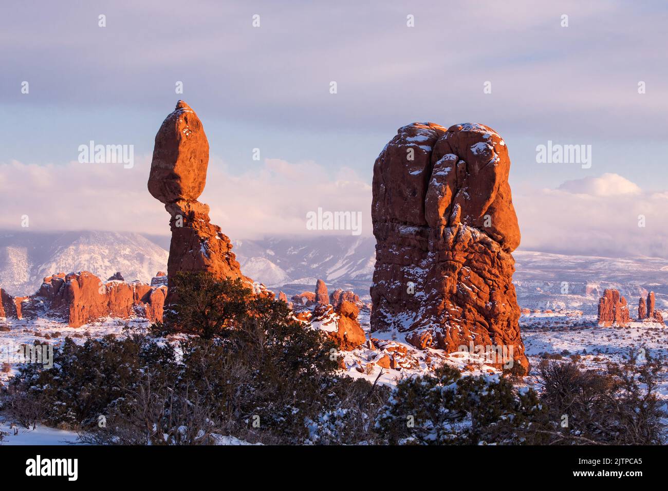 Balanced Rock after a winter snowfall in Arches National Park, Moab ...