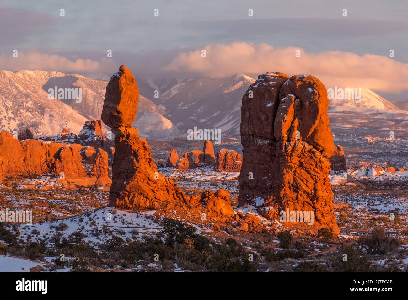 Balanced Rock, Owl Rock and Turret Arch behind after a winter snowfall ...