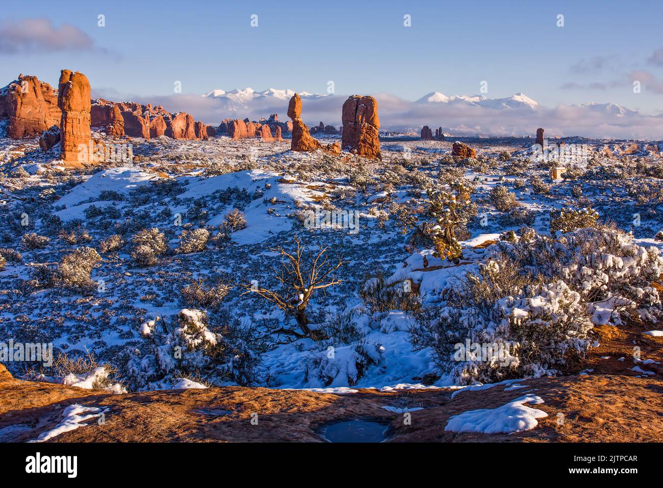Balanced Rock after a winter snowfall in Arches National Park, Moab ...