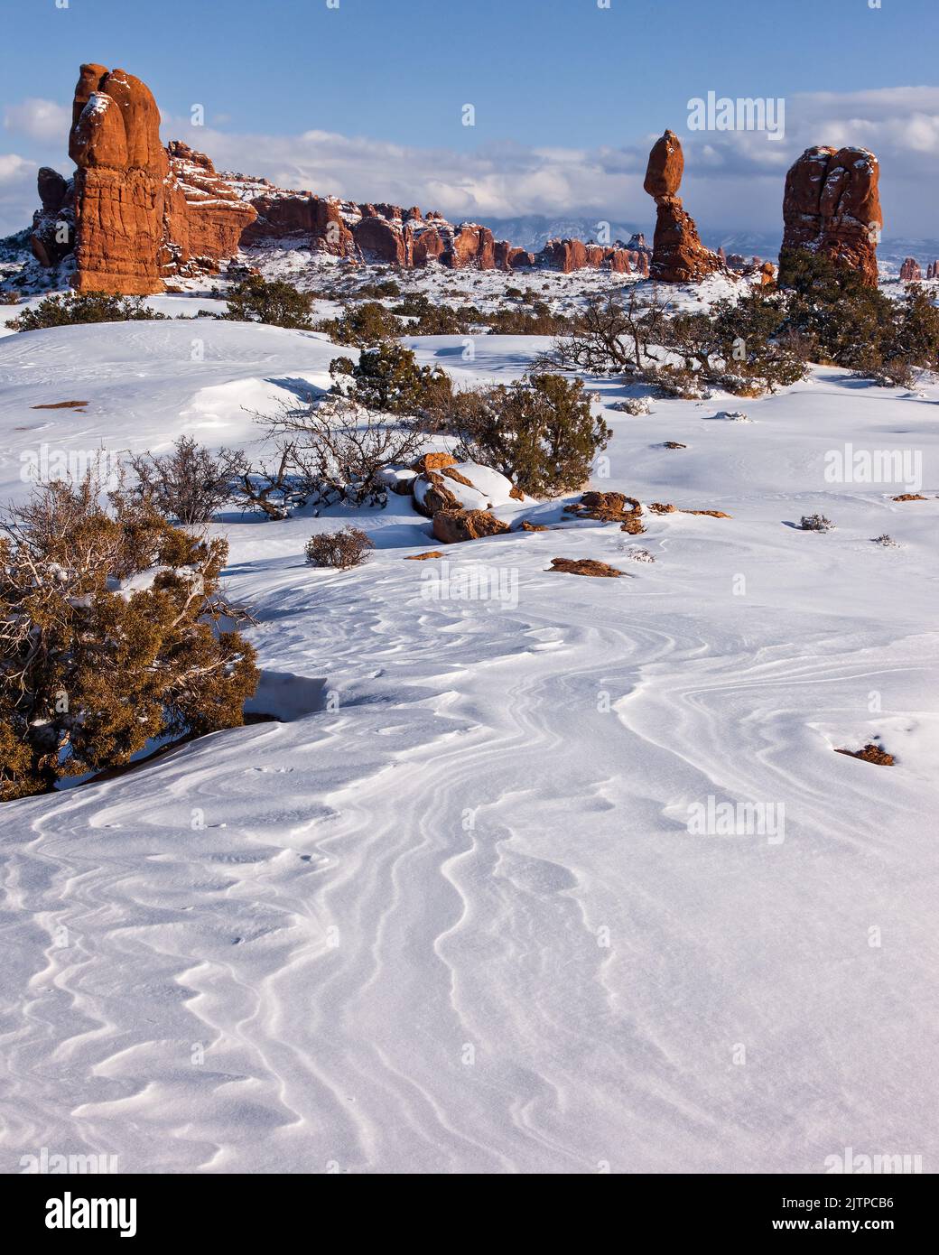 Balanced Rock after a winter snowfall in Arches National Park, Moab ...