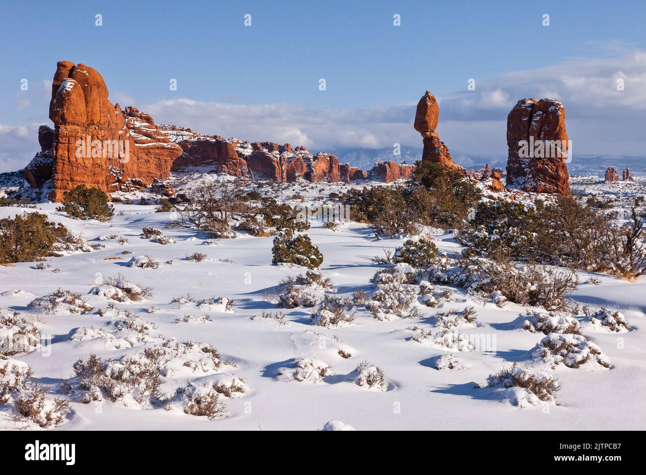 Balanced Rock after a winter snowfall in Arches National Park, Moab ...