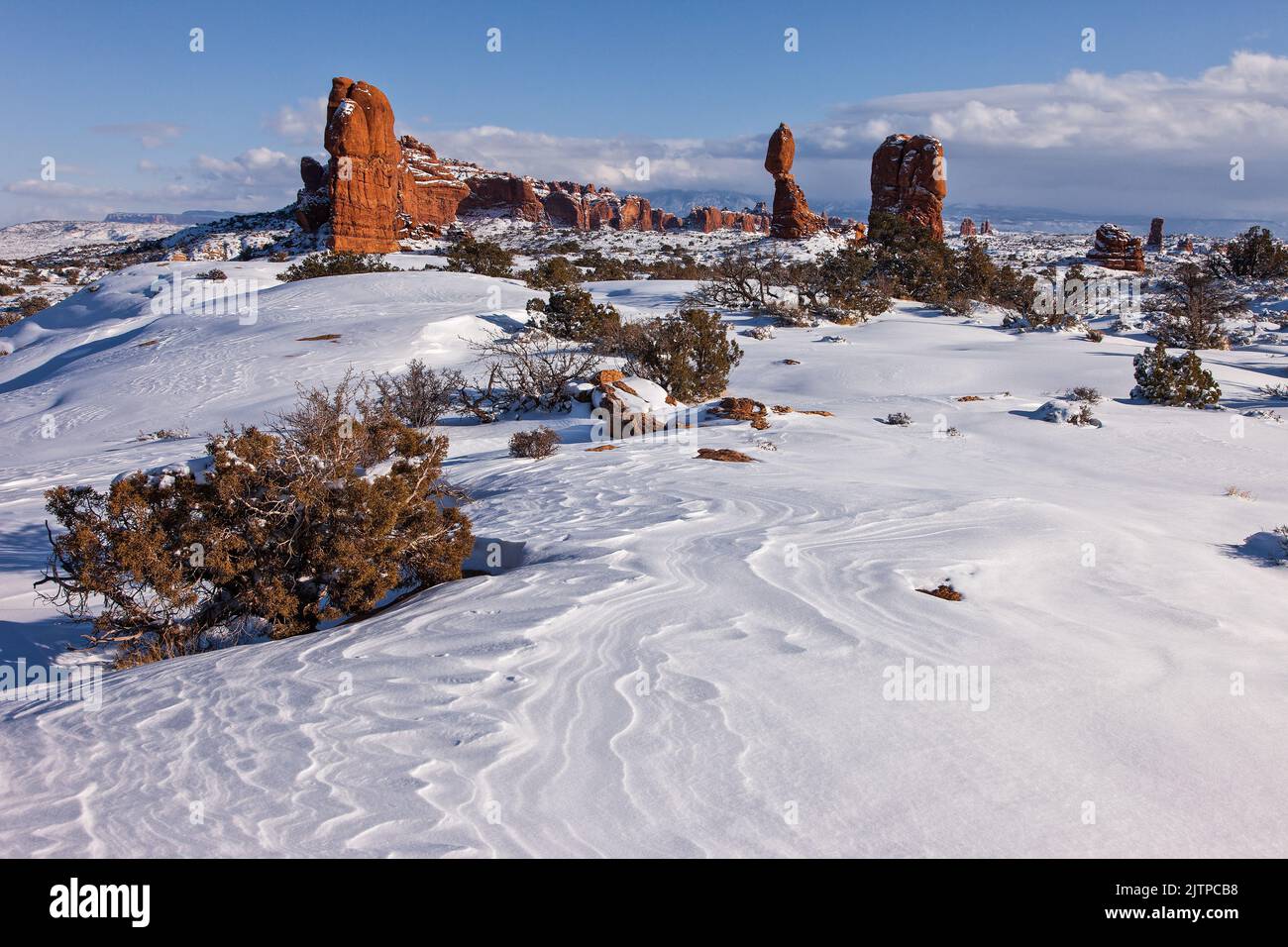 Balanced Rock after a winter snowfall in Arches National Park, Moab ...