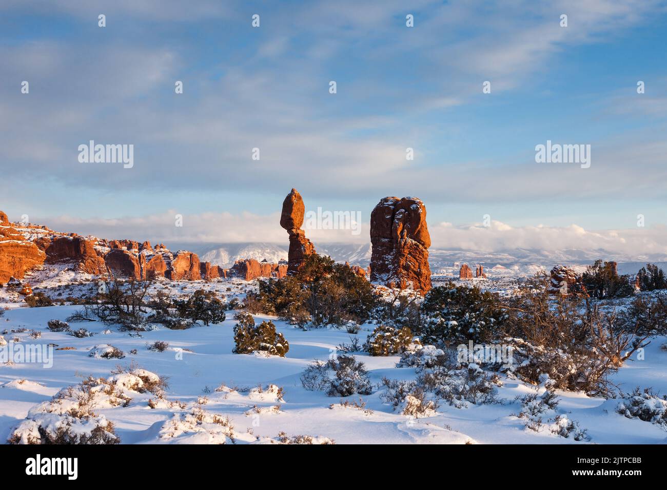 Balanced Rock after a winter snowfall in Arches National Park, Moab ...