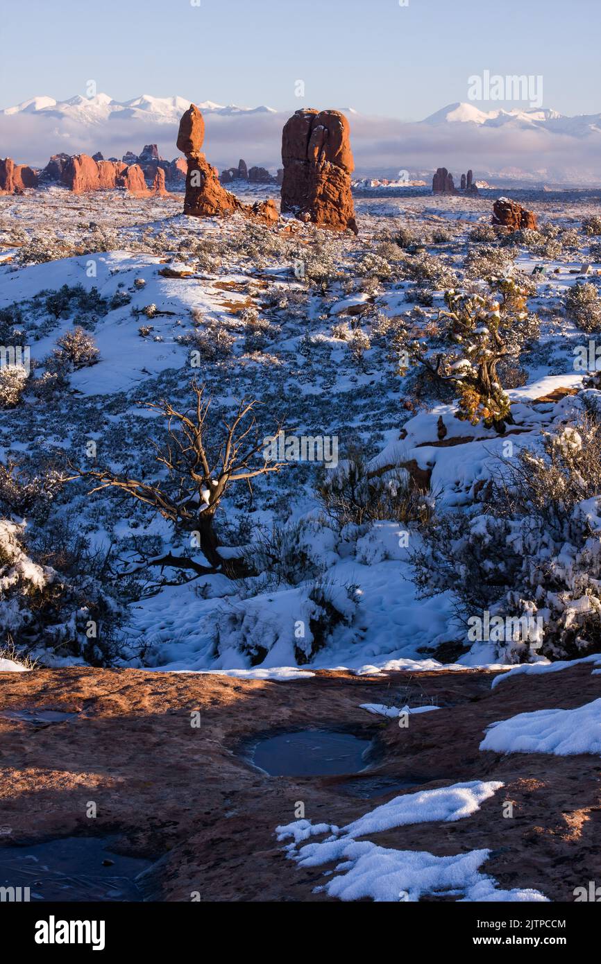 Balanced Rock after a winter snowfall in Arches National Park, Moab ...