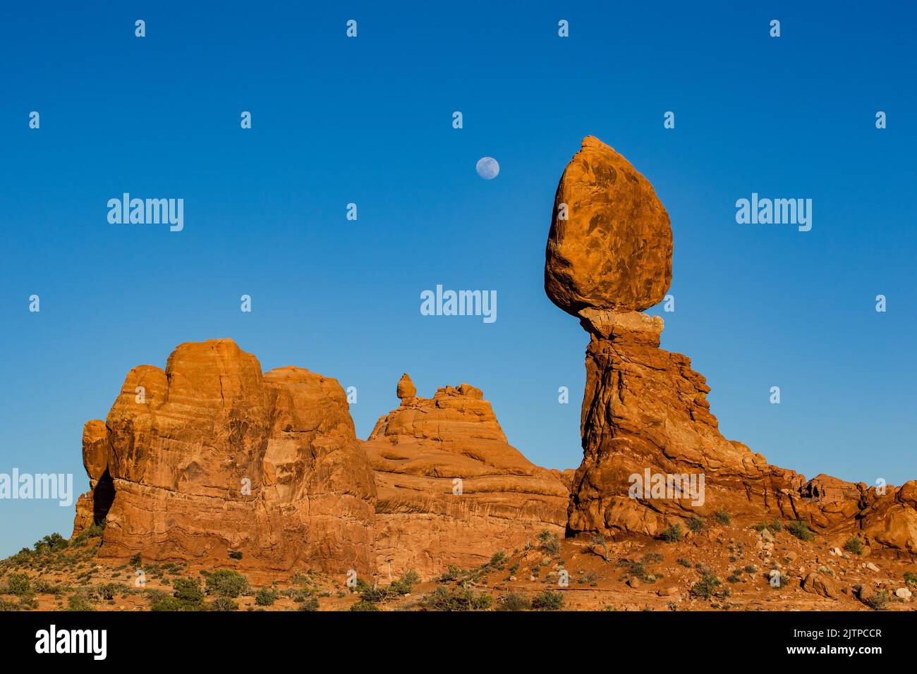 Balanced Rock with its mini clone, Ham Rock with a rising moon in ...
