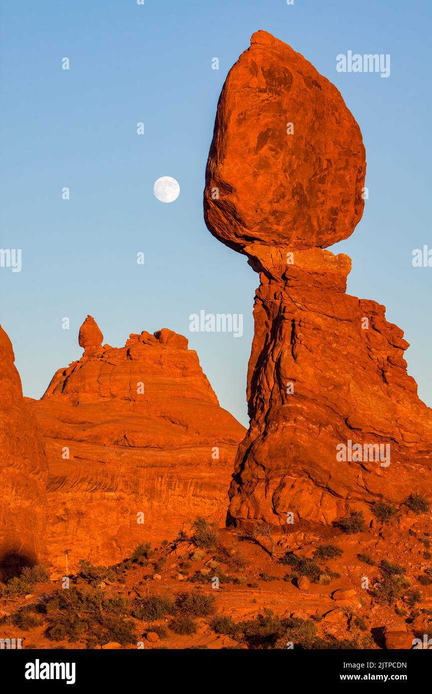 Balanced Rock with its mini clone, Ham Rock with a rising moon in ...