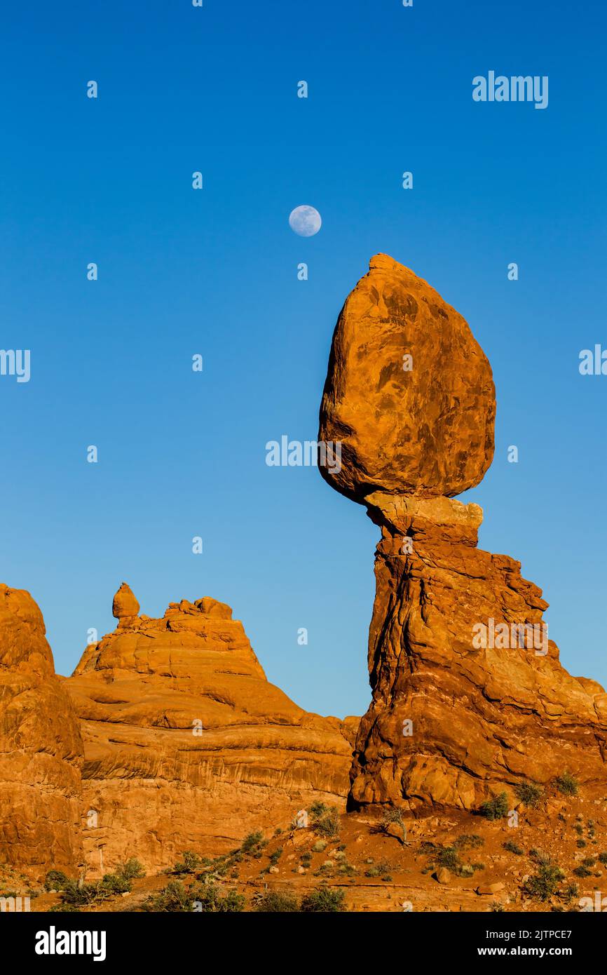 Balanced Rock with its mini clone, Ham Rock with a rising moon in ...