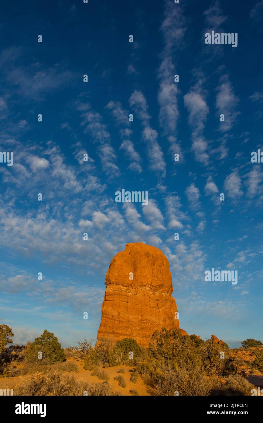 Entrada Sandstone formation with buttermilk clouds in the Balanced Rock ...