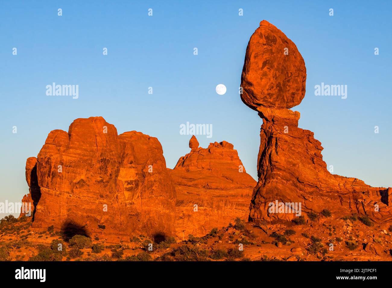 Balanced Rock with its mini clone, Ham Rock with a rising moon in ...