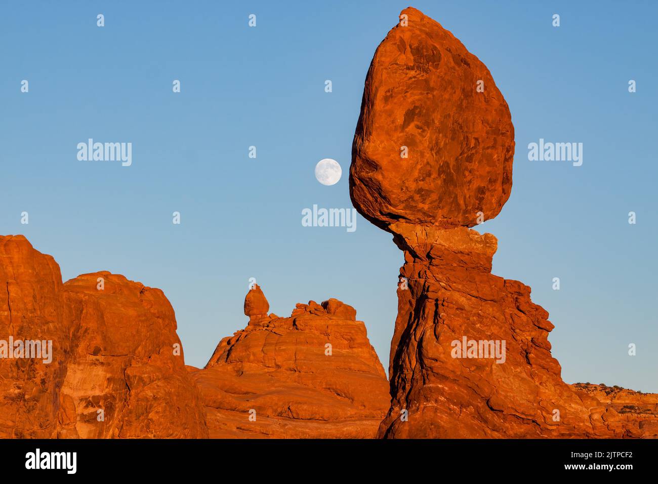 Balanced Rock with its mini clone, Ham Rock with a rising moon in ...