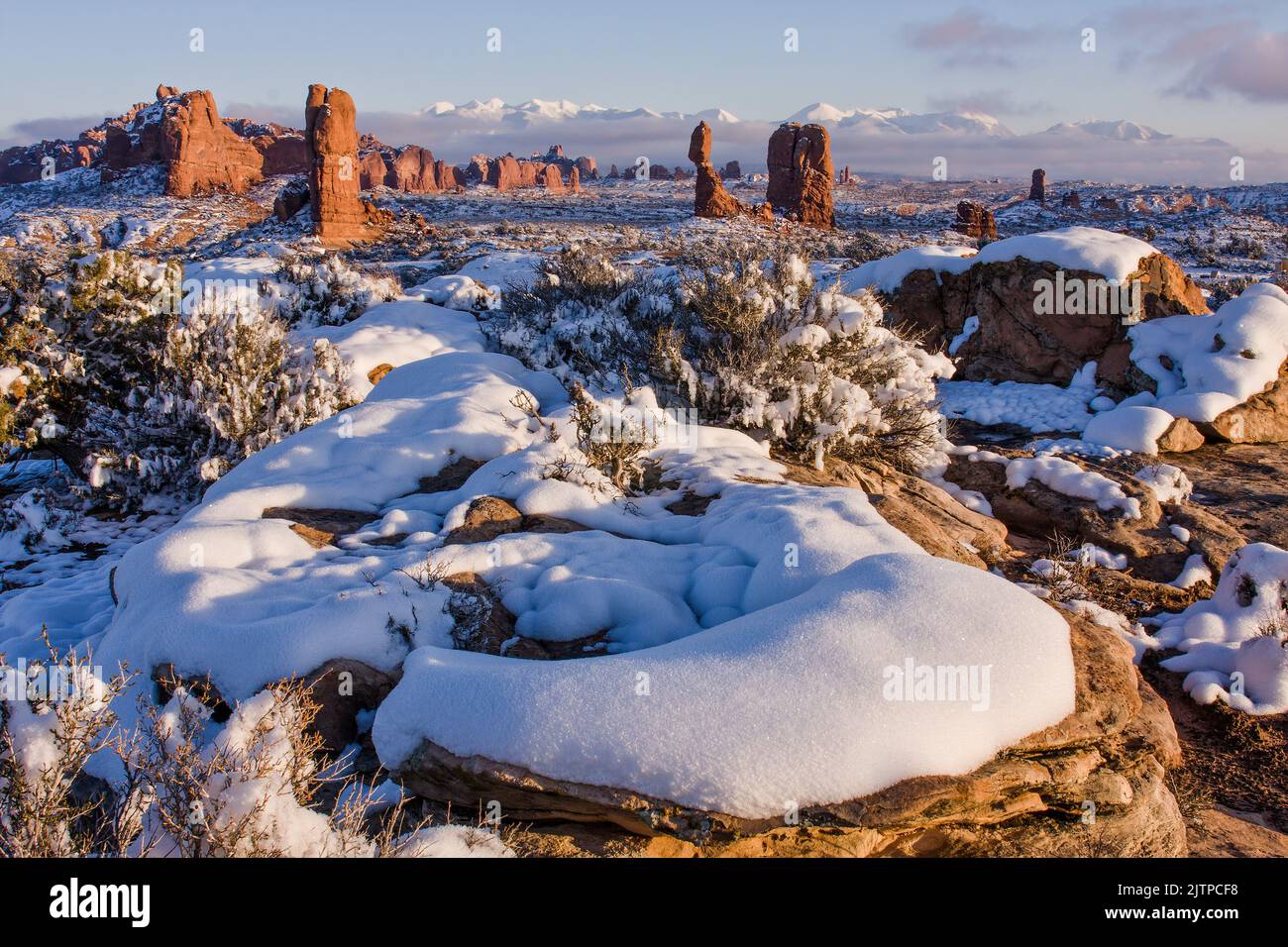 Snow on the sandstone near Balanced Rock after a winter storm in Arches ...
