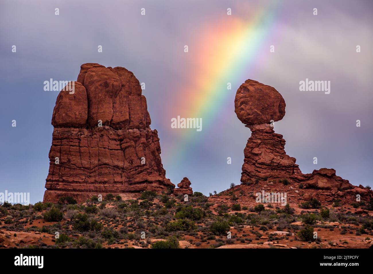 Rainbow behind rock hi-res stock photography and images - Alamy