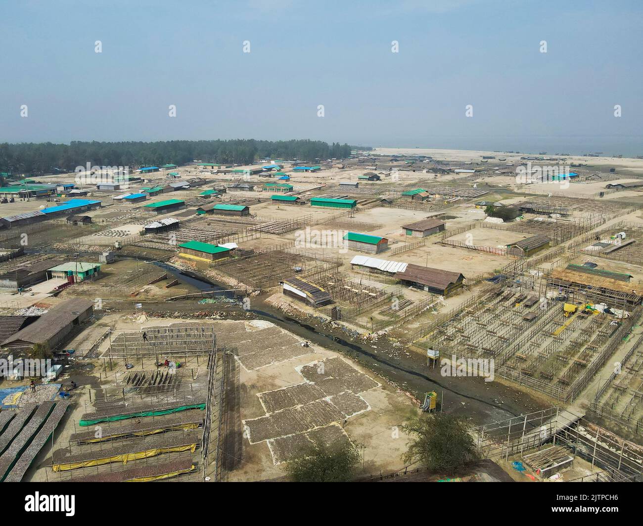 Aerial view of dried fish processing. One of the oldest methods of food ...