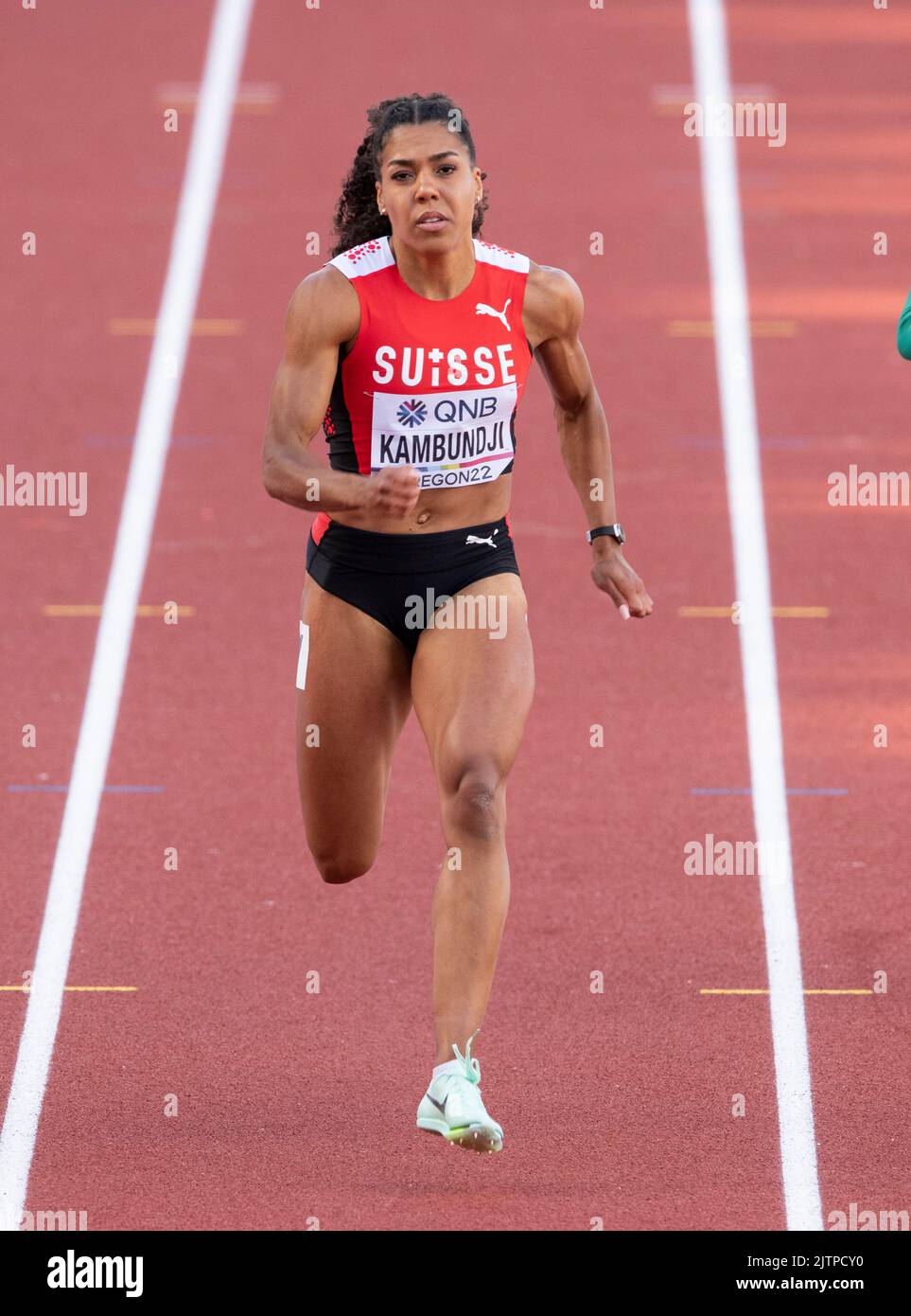 Mujinga Kambundji of Switzerland competing in the women’s 100m heats at ...