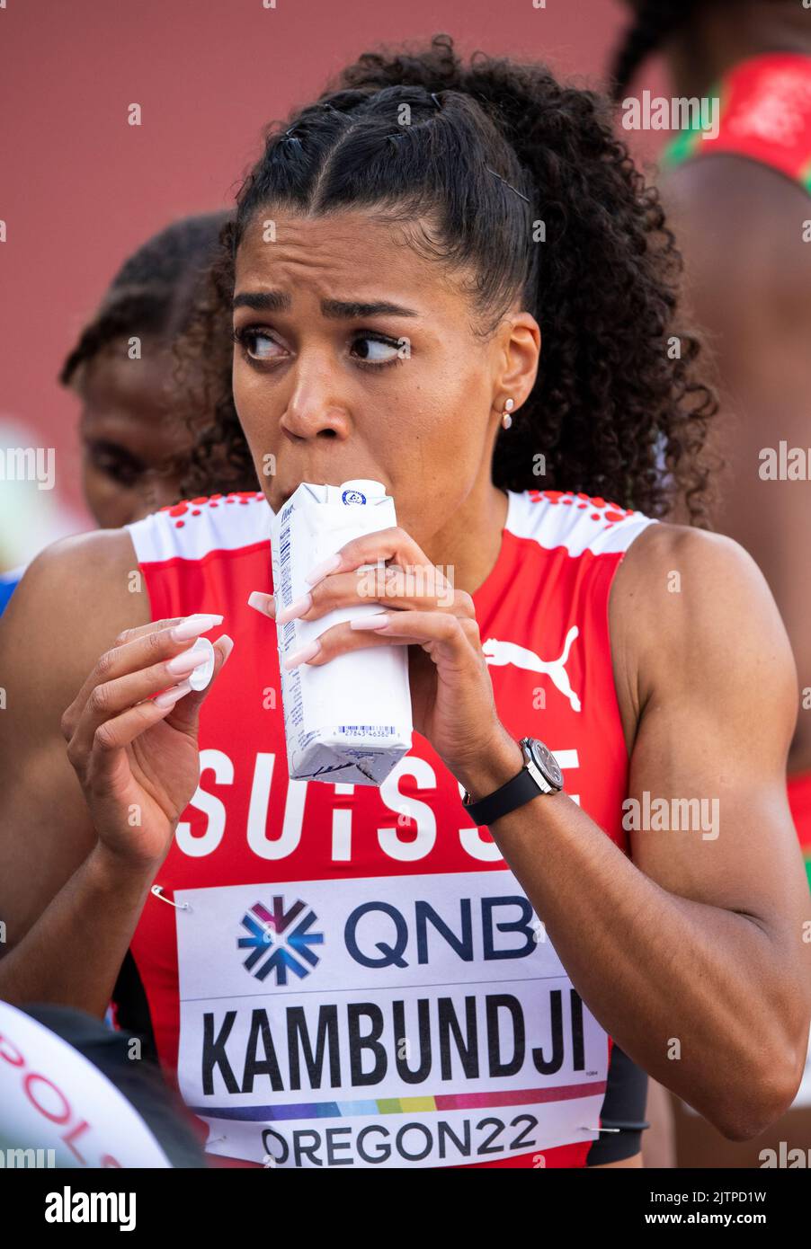 Mujinga Kambundji of Switzerland competing in the women’s 100m heats at ...