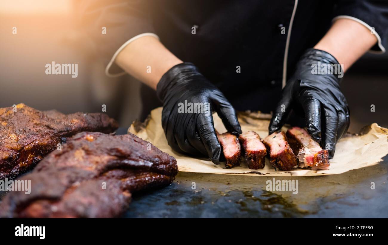 grill restaurant kitchen chef smoked pork ribs Stock Photo - Alamy