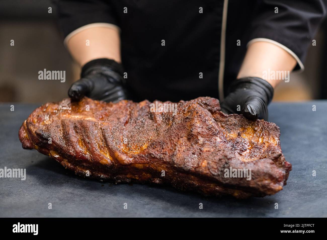 grill restaurant kitchen chef smoked pork ribs Stock Photo - Alamy
