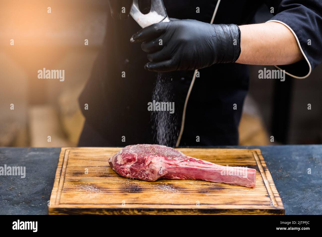 steakhouse kitchen cowboy recipe steak salting beef meat Stock Photo ...