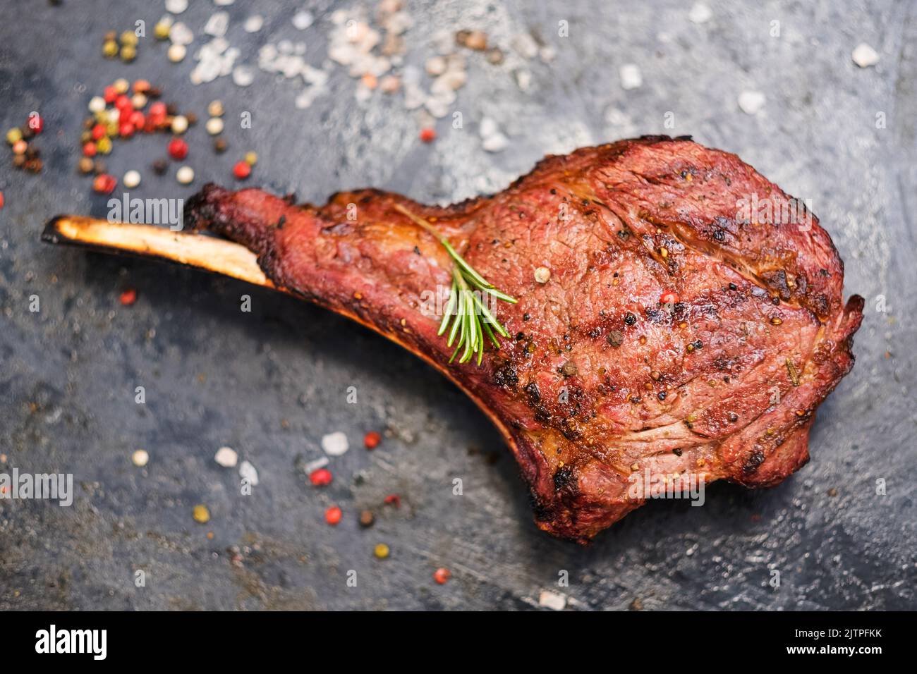 steakhouse menu cowboy steak seasoning rosemary Stock Photo - Alamy