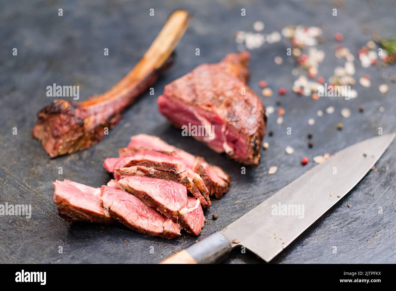 steakhouse kitchen cowboy steak sliced beef meat Stock Photo - Alamy