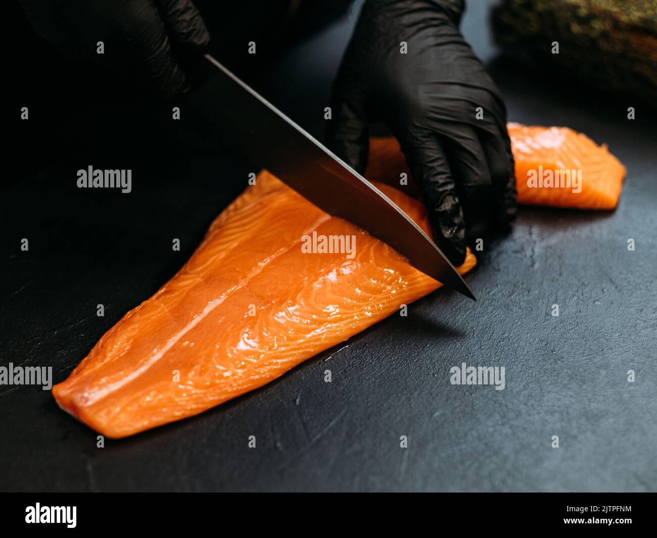 seafood restaurant chef cut fresh salmon fillet Stock Photo - Alamy