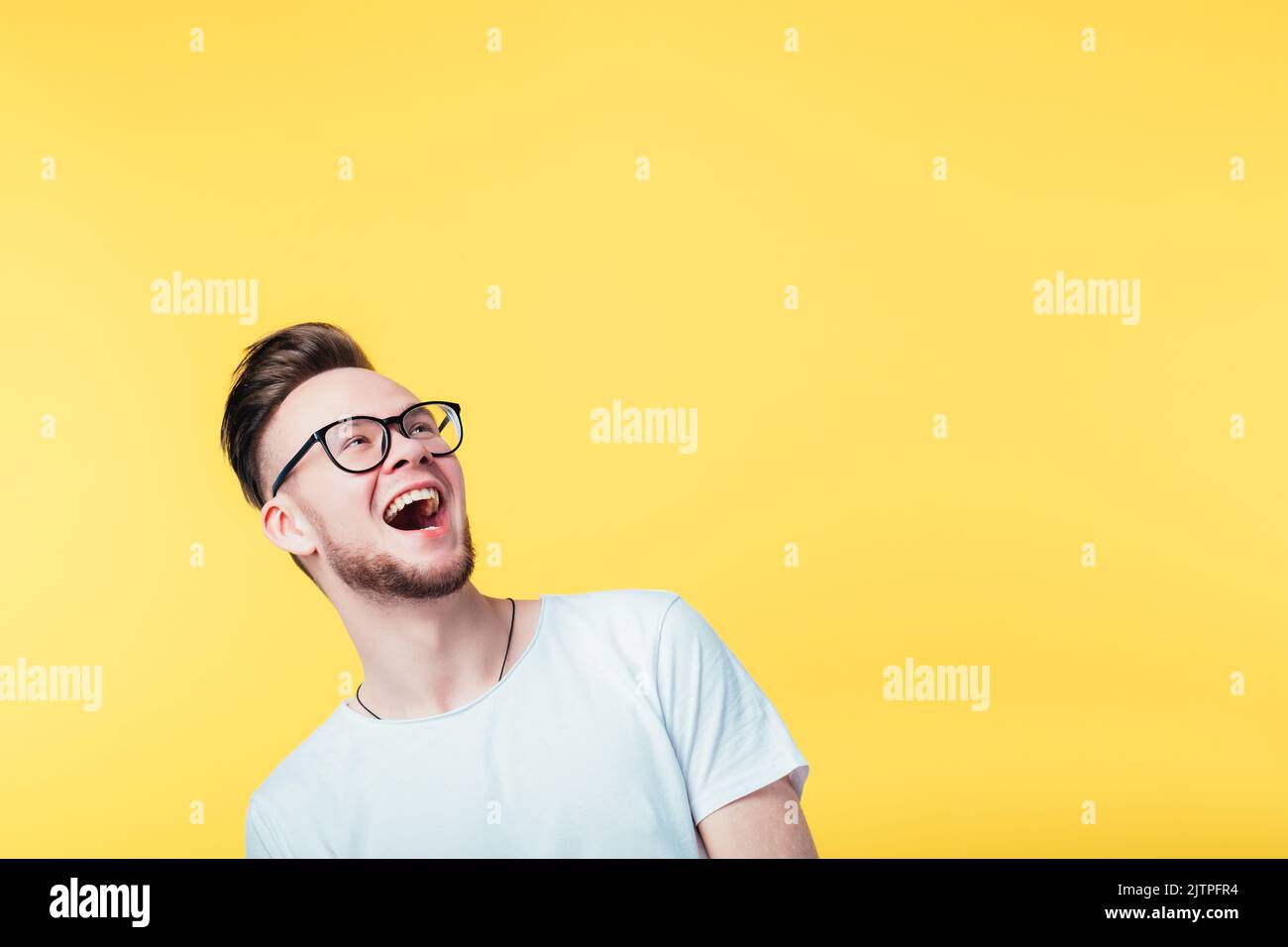 young man excited mouth open wow release Stock Photo - Alamy