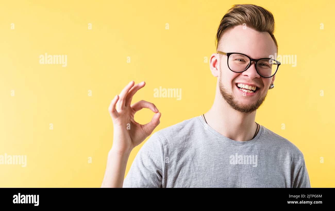 positive friendly smiling emotional guy portrait Stock Photo - Alamy