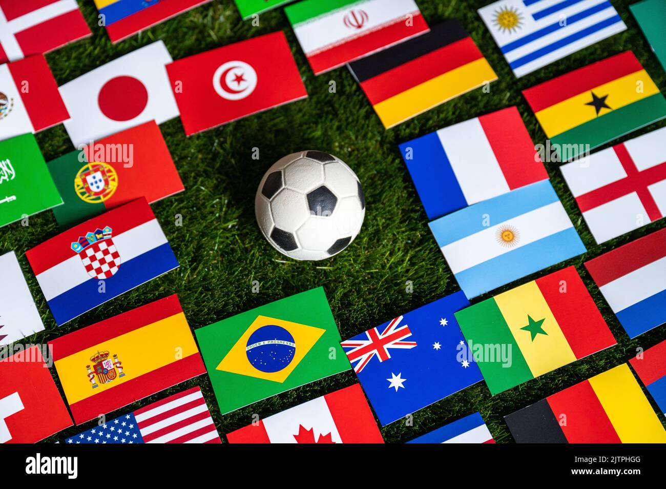 Football Ball and Flags of all 32 Countries which will play in Qatar ...