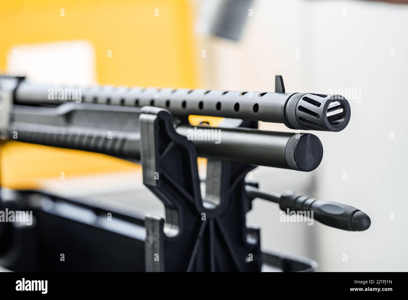 Automatic rifle on stand on the table of the weapons workshop Stock ...