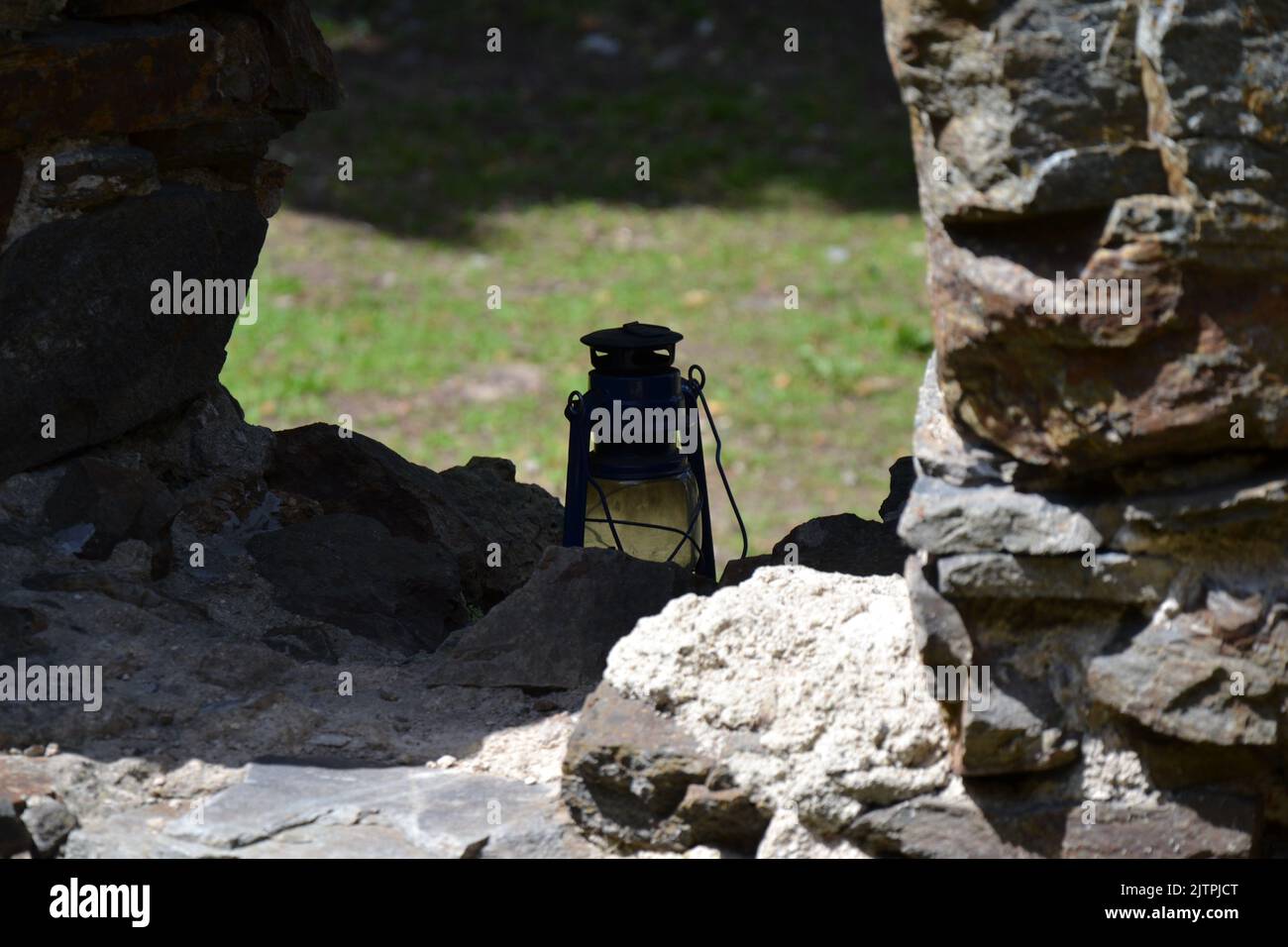 Lantern in a opening of a rock wall at Cornstejn castle Stock Photo - Alamy