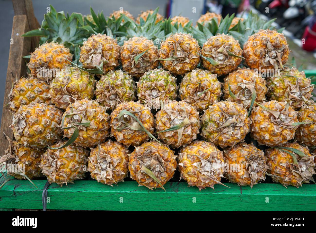 Pineapple fruit sold in traditional markets Stock Photo - Alamy