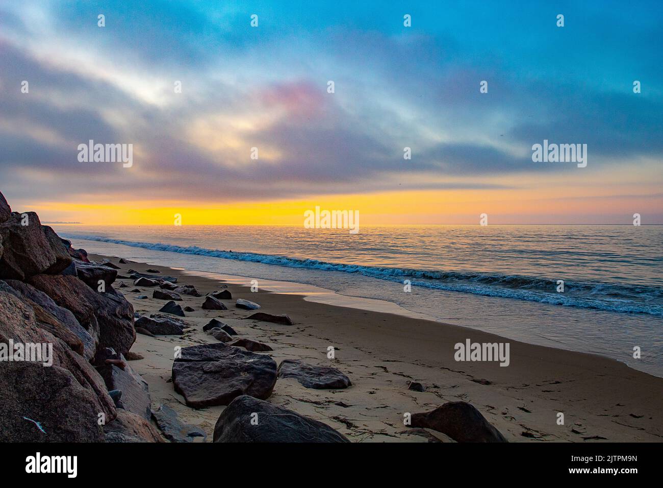 Sunrise on the beach in Rhode Island, USA with clouds in the sky Stock ...