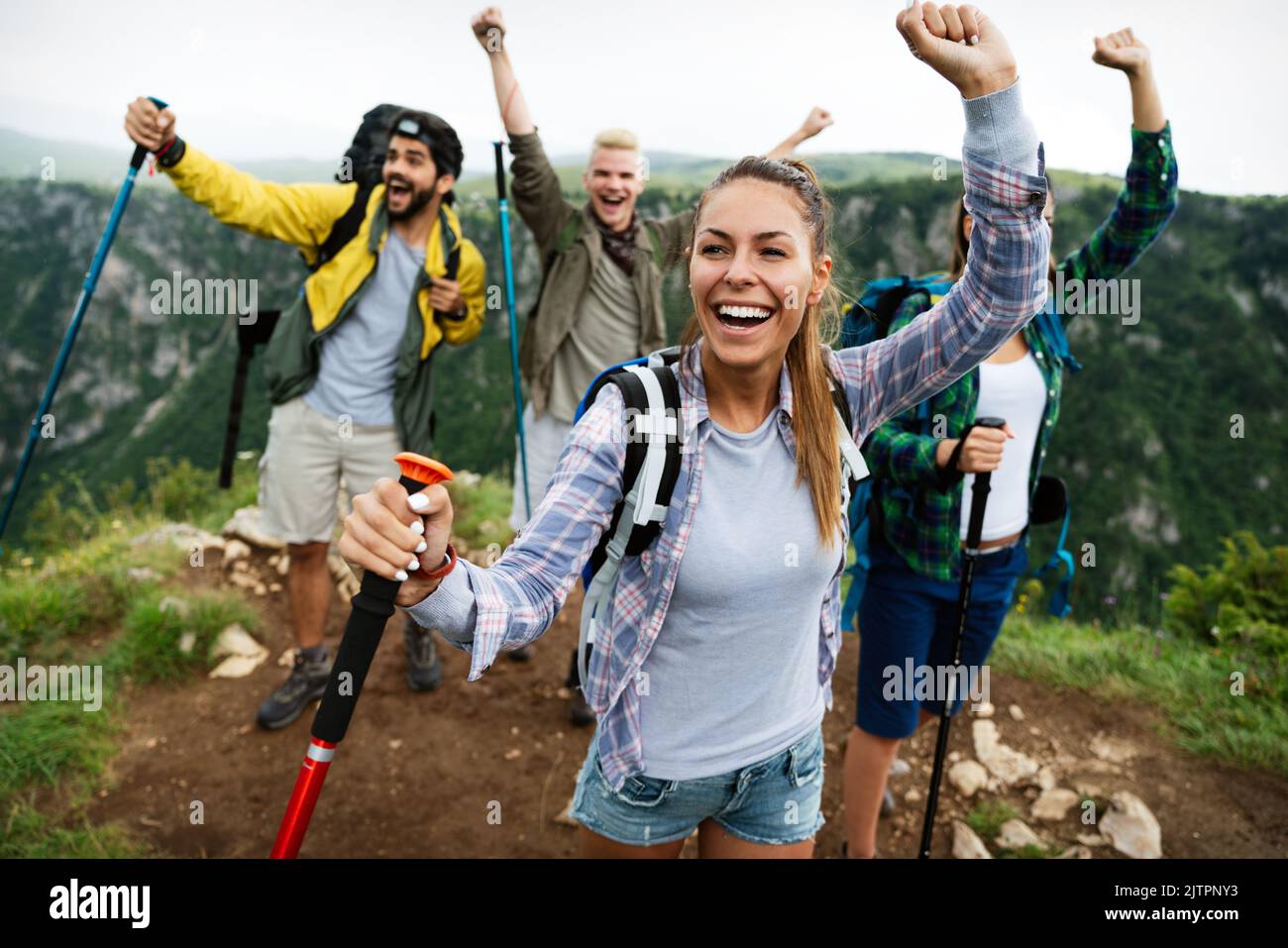 Group of happy friends enjoying outdoor activity together Stock Photo ...
