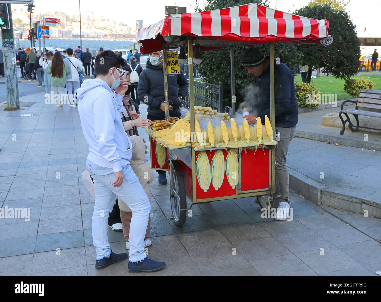 ISTANBUL,TURKEY-OCTOBER 30: Unidentified Customers buying corn near ...