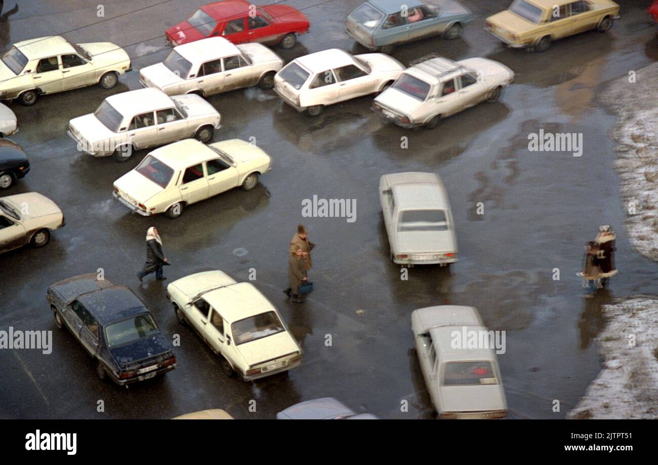 Bucharest, Romania, January 1990. Vehicles in traffic at Romana Square ...