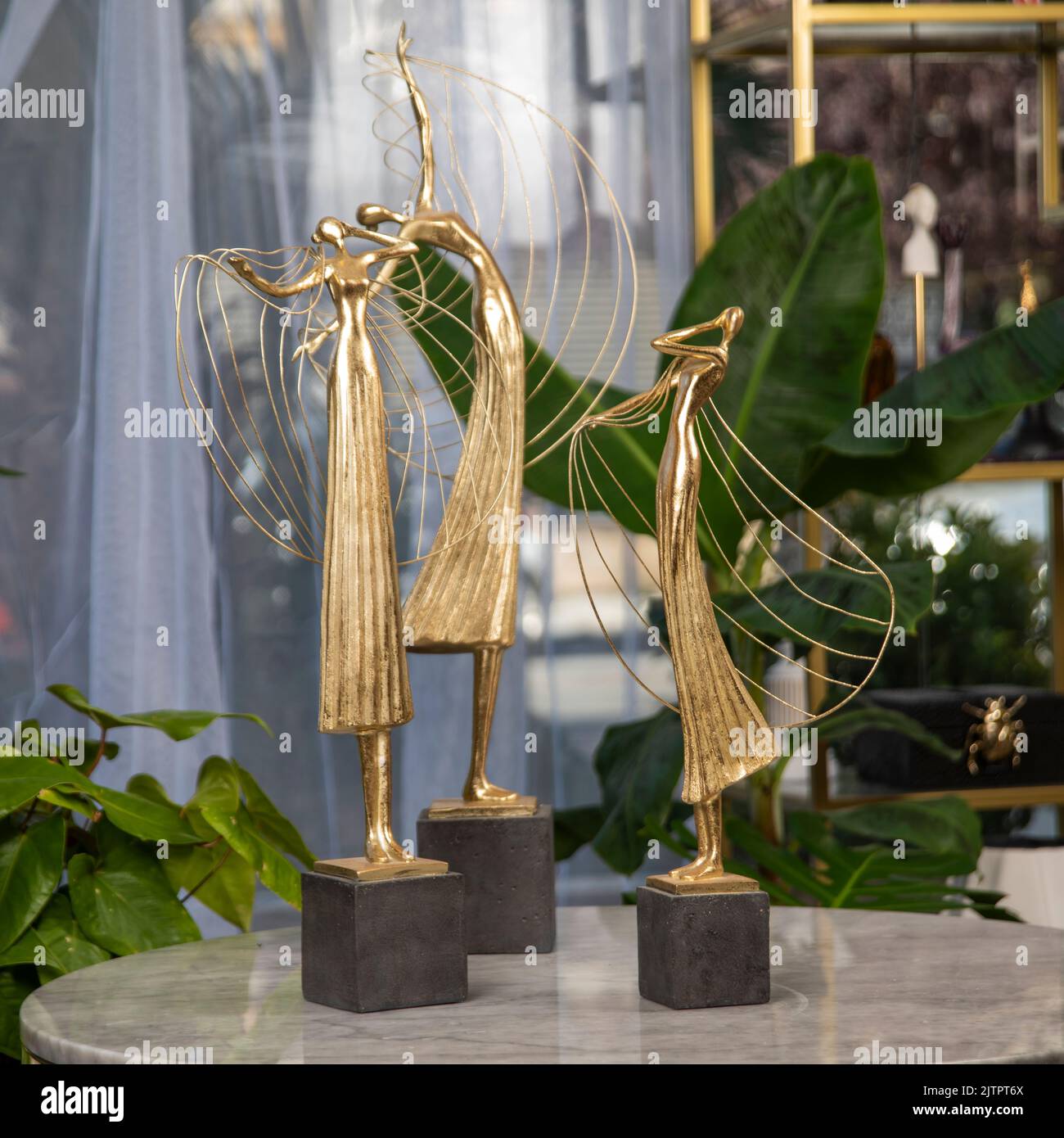 decorative metal statues in the living room Stock Photo - Alamy