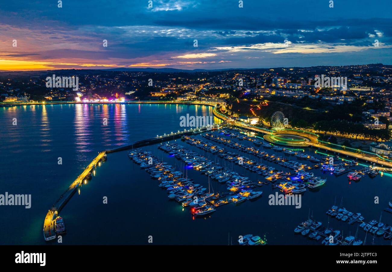 Sunset over Torquay Harbour and Marina, English Riviera from a drone ...
