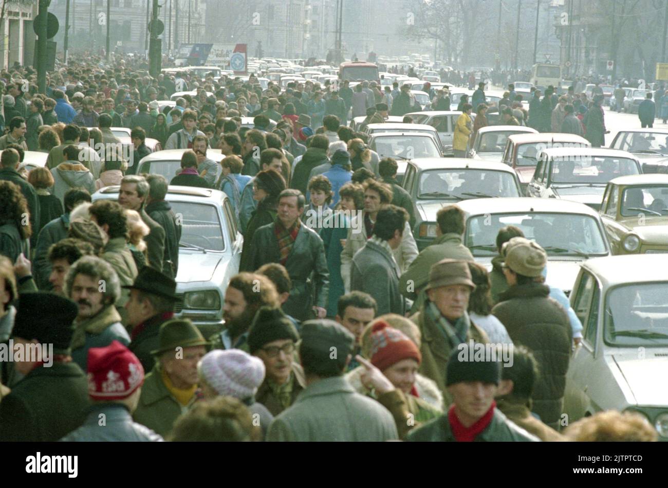 Bucharest, Romania, January 1990. People and vehicles in downtown ...